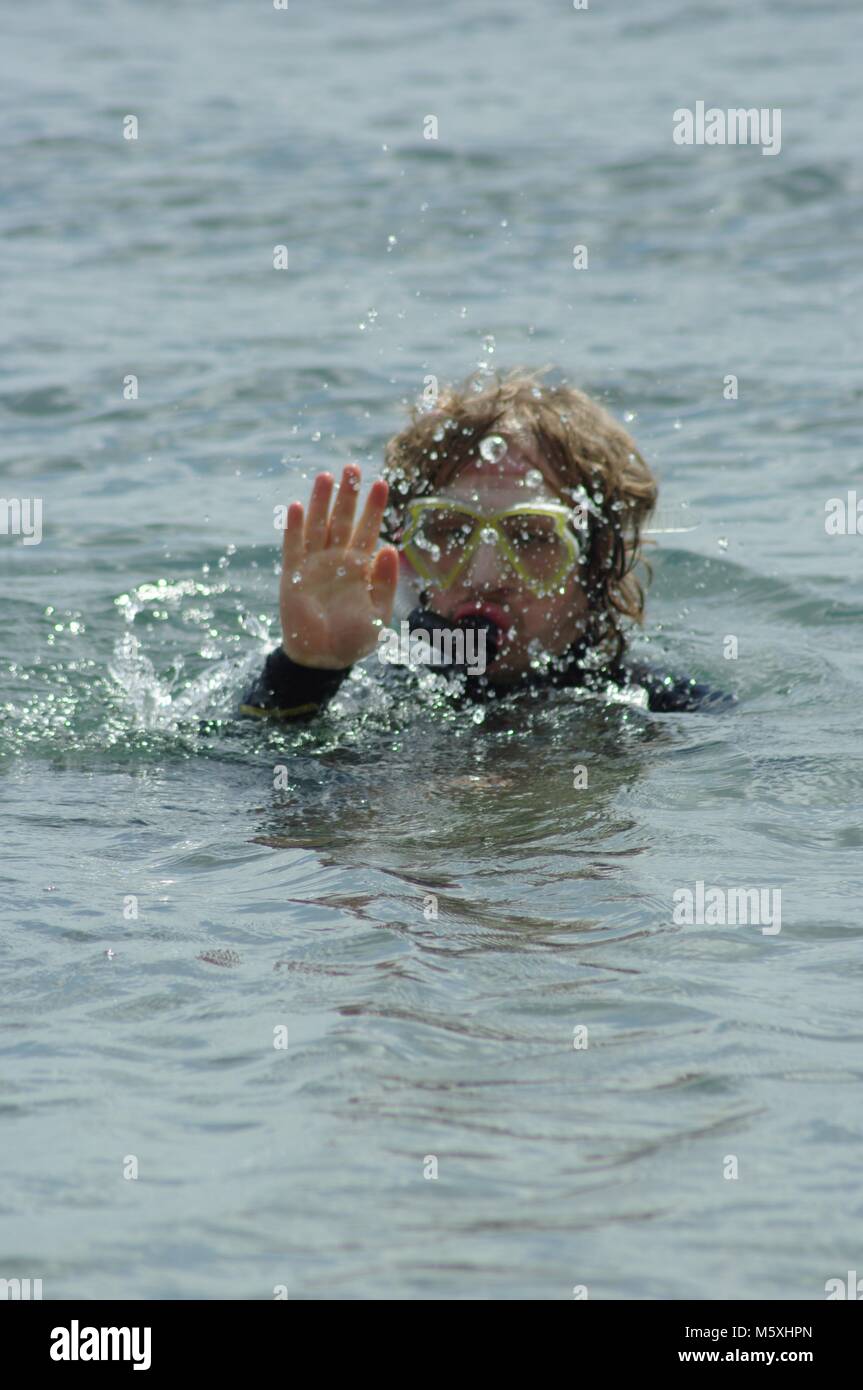 Young Man, Snorkelling, Splashing and Waving "Drowning" at Oddicombe ...