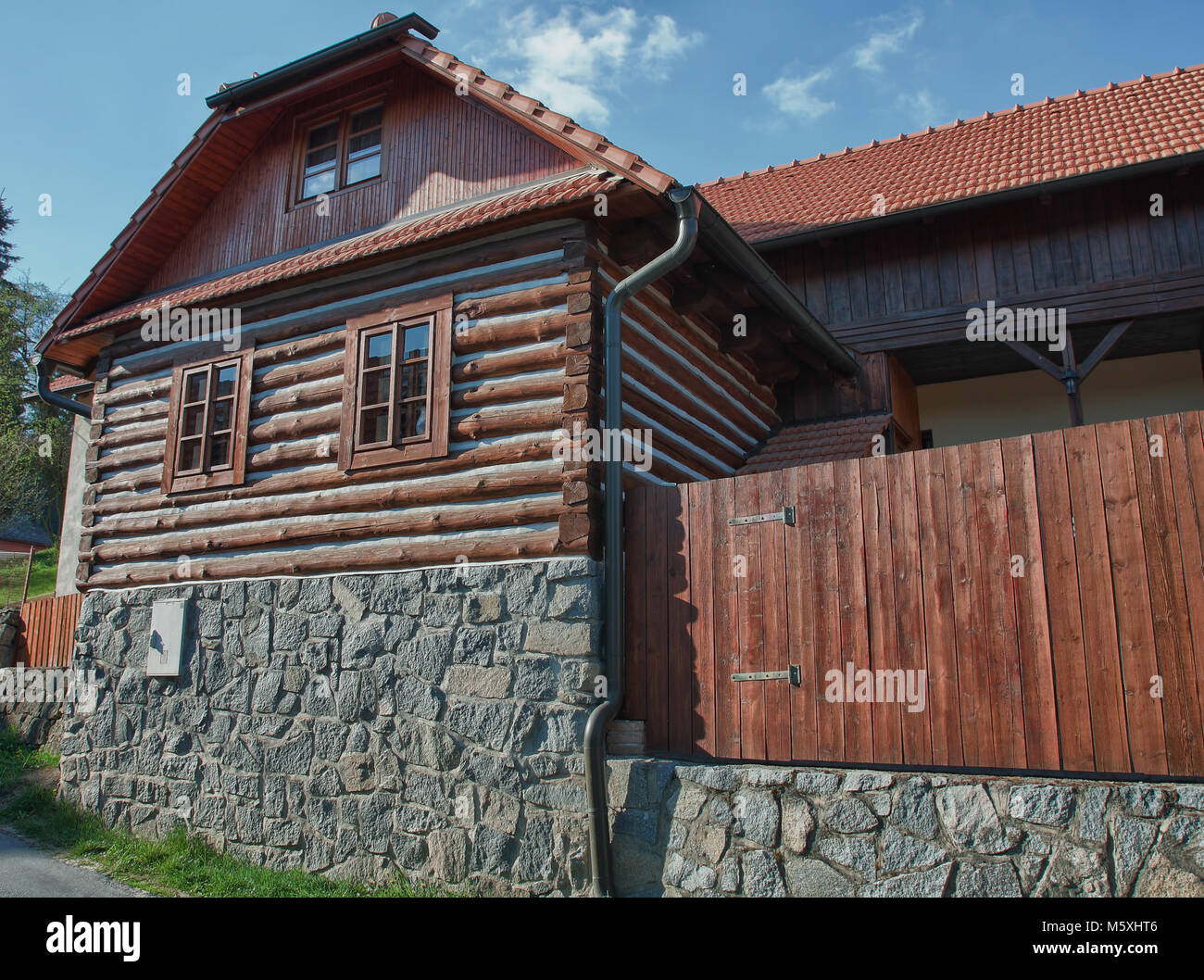Classic czech wooden house in the spring day in small village Stock ...