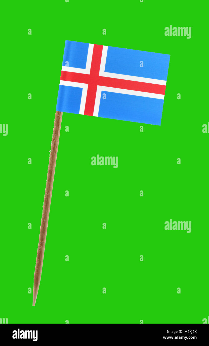 Tooth pick wit a small paper flag of Iceland on a green screen for ...