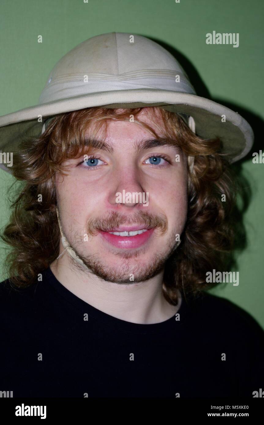 Young, Ruggedly Handsome British Man Wearing an Old Khaki Pith Helmet ...
