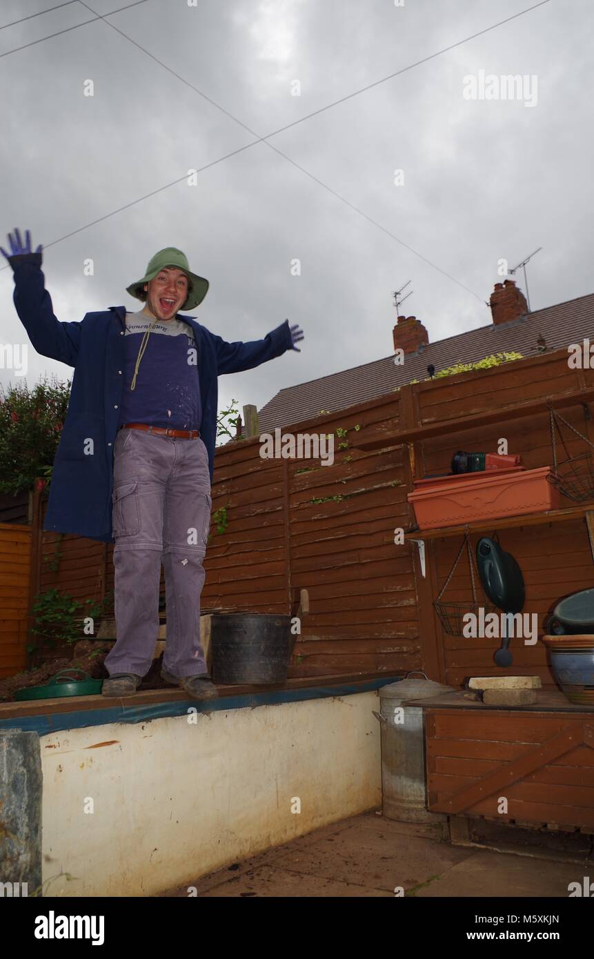 Young Scruffy Gardener, Jumping from Vegetable Plot. British Council ...