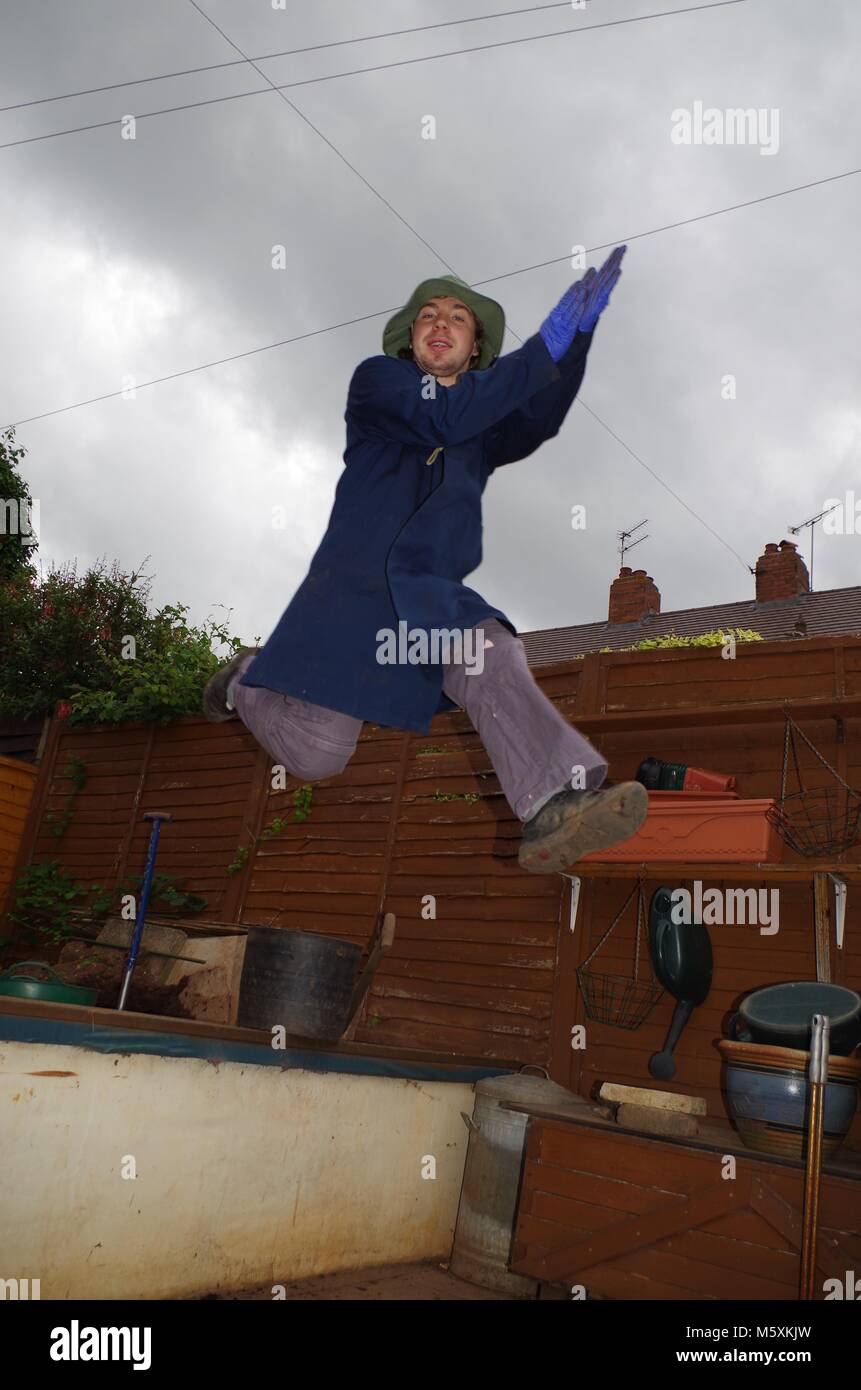 Young Scruffy Gardener, Jumping from Vegetable Plot. British Council ...