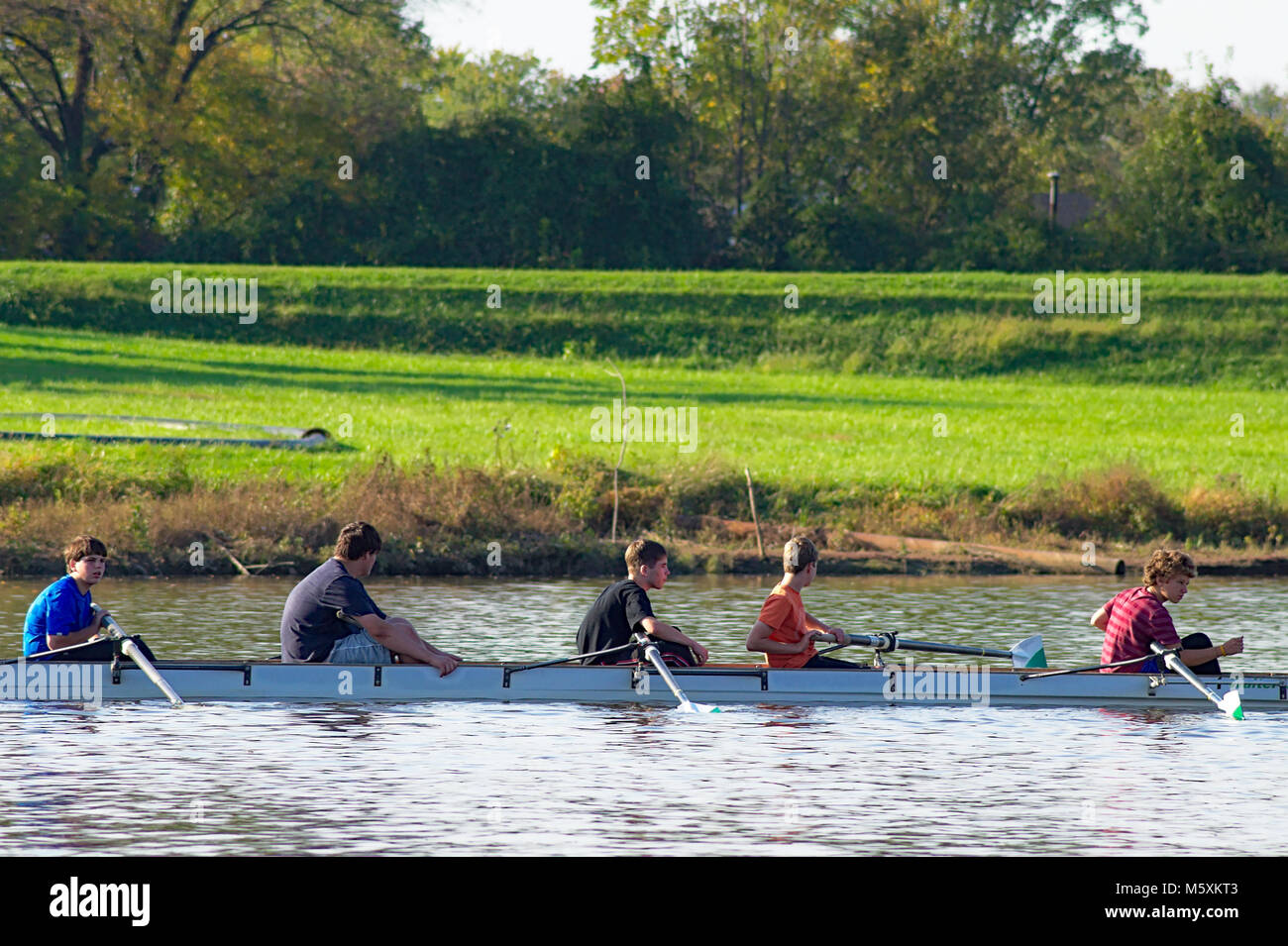 Young kids rowing team practicing on the Weekend Stock Photo - Alamy