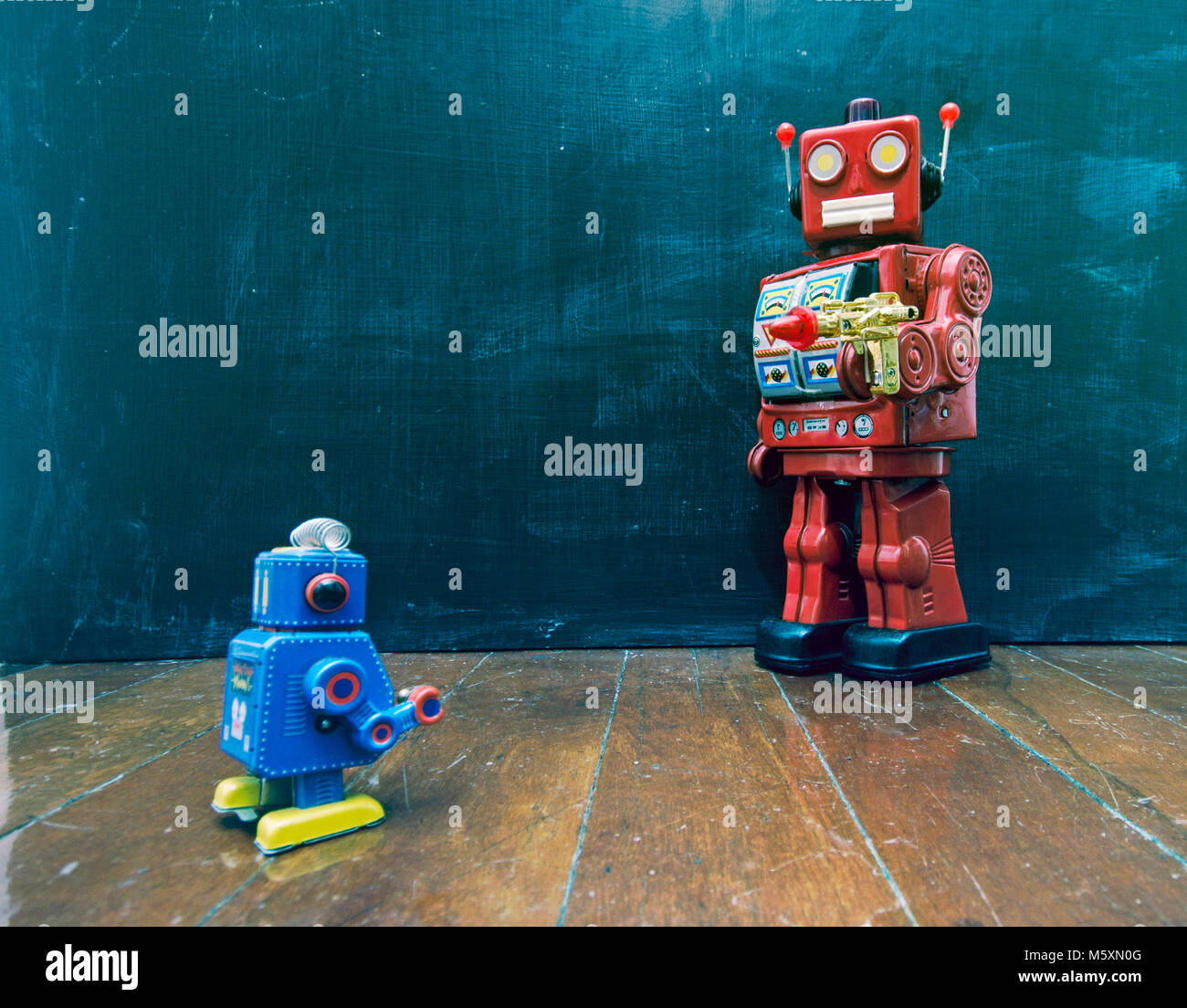 retro red ray gun on a black background Stock Photo - Alamy