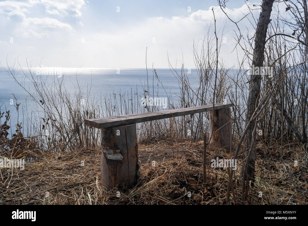 The bench at the height and the view of the ocean from above Stock ...