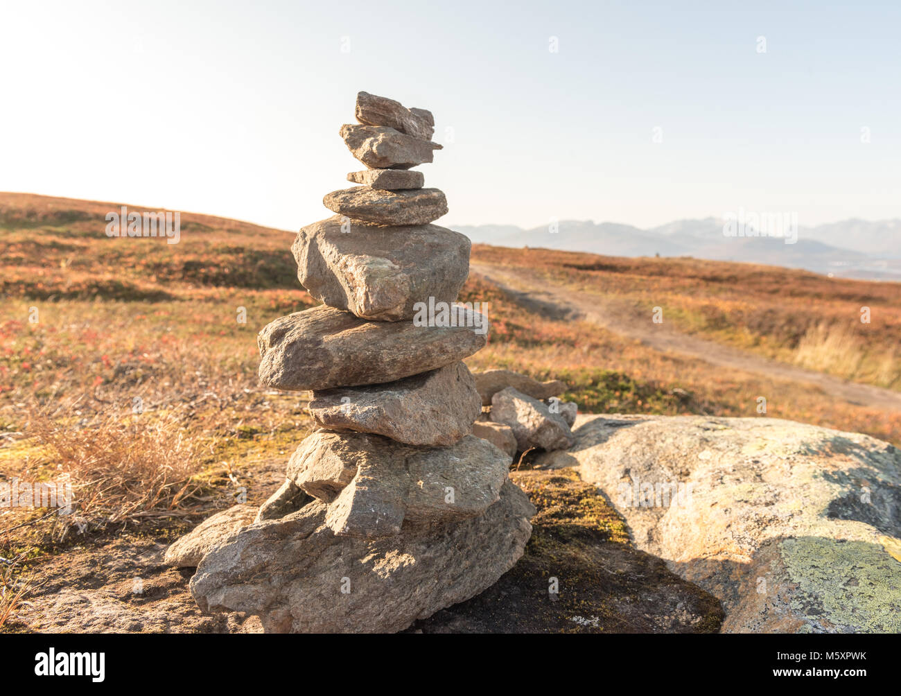 Tall stack of natural irregular stones balanced on top of one another ...