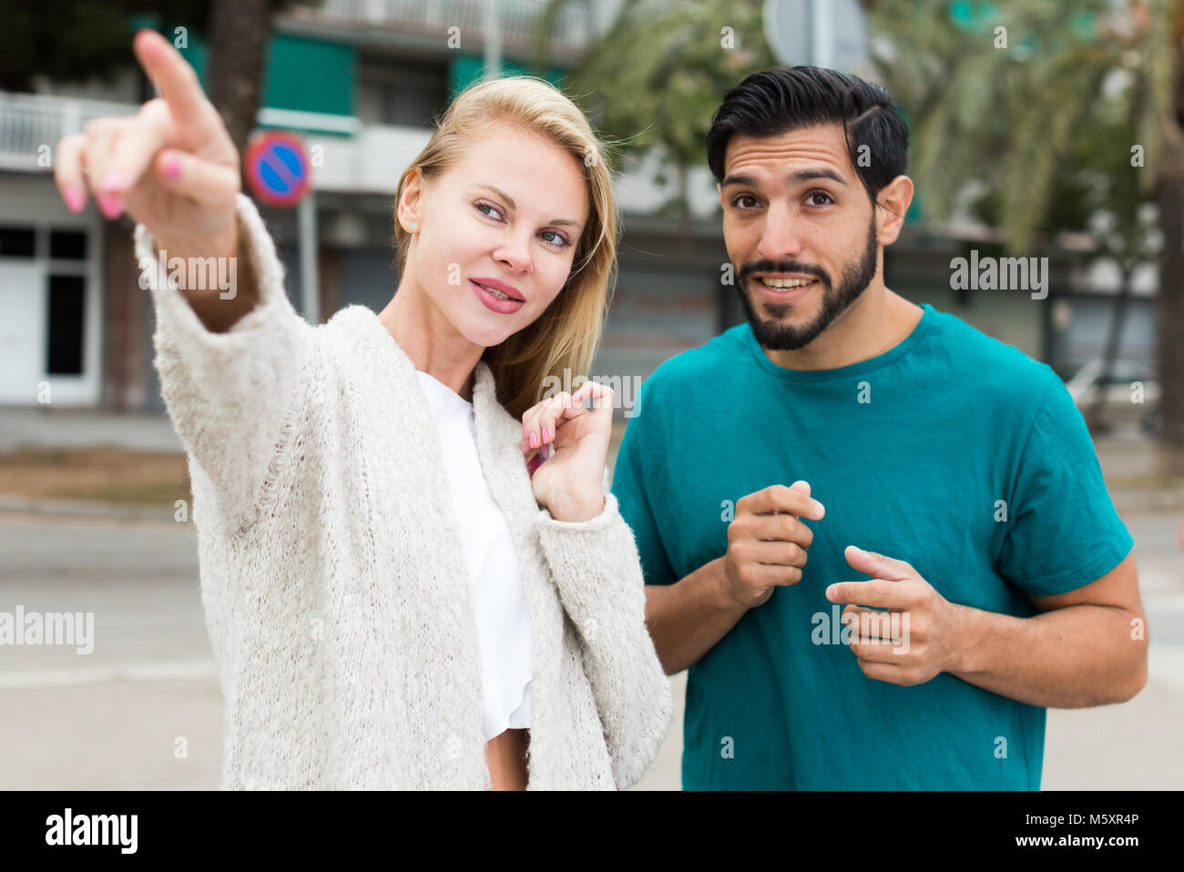 Stranger helping woman hi-res stock photography and images - Alamy