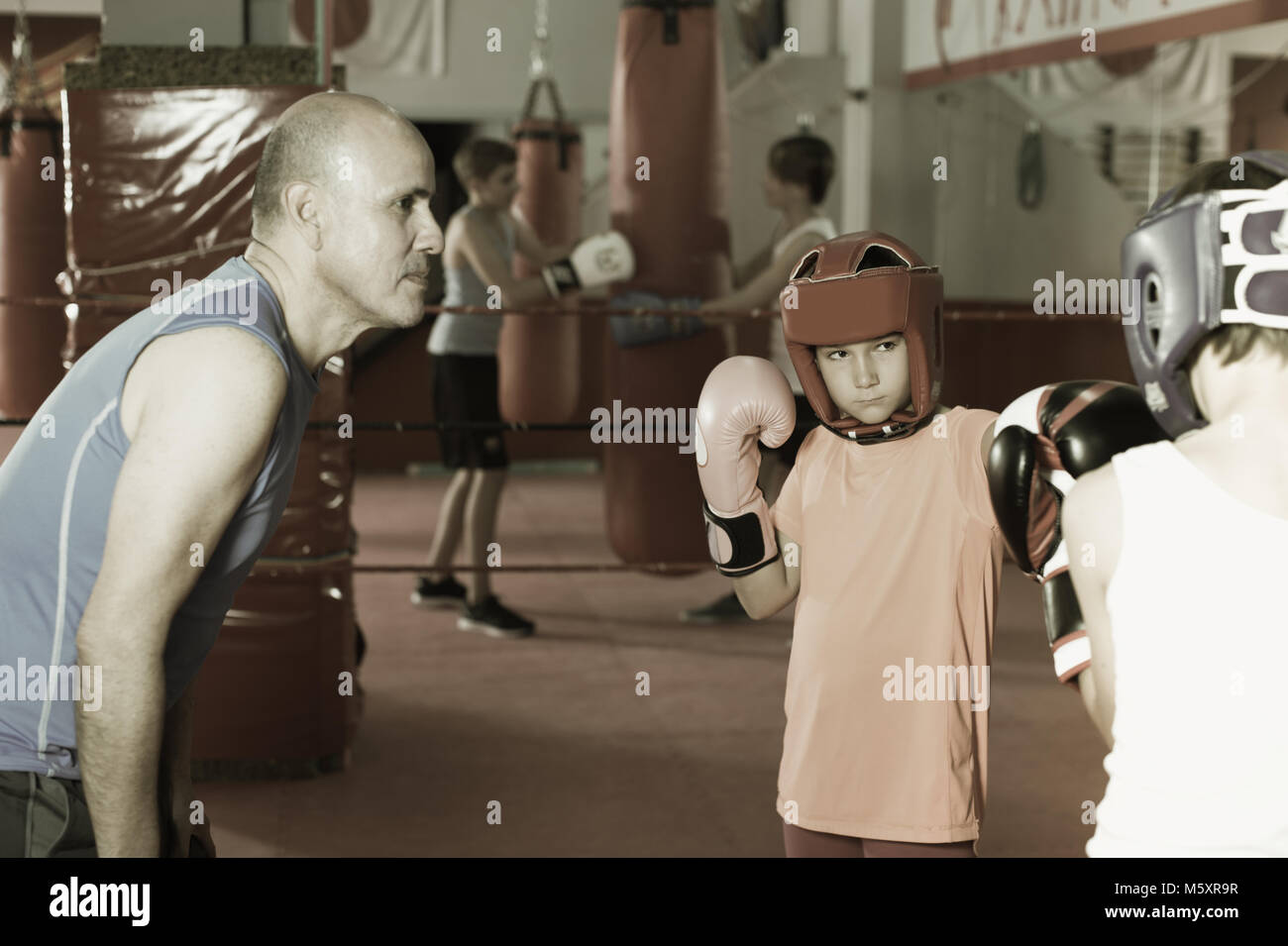 Two boys boxing in ring hi-res stock photography and images - Alamy