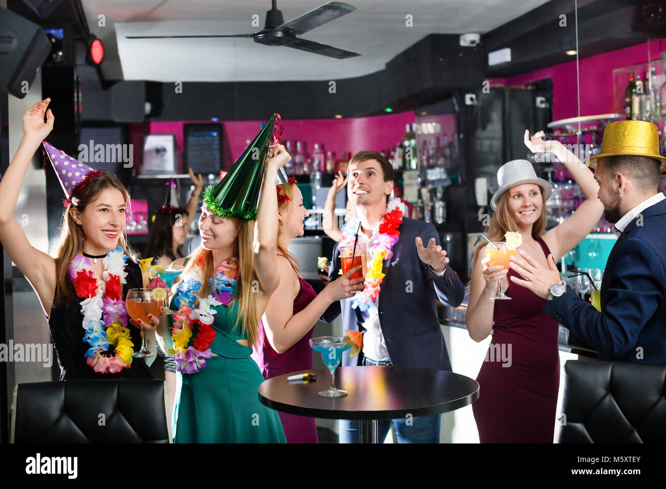 Young friends dancing on a birthday party with the cocktails Stock ...
