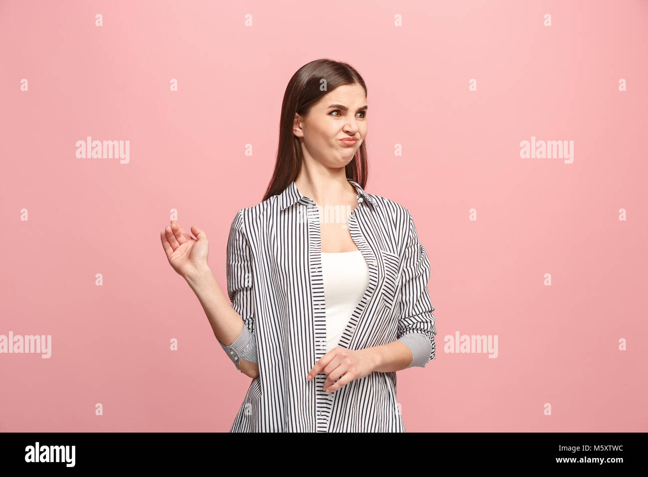 Young Woman With Disgusted Expression Repulsing Something Isolated On