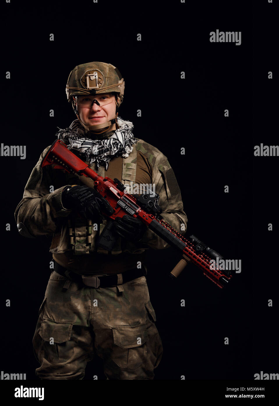Image of soldier in helmet with gun Stock Photo - Alamy