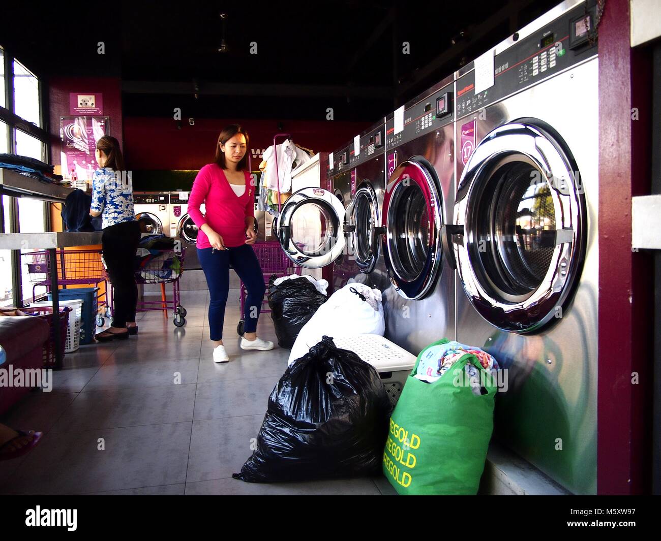 ANTIPOLO CITY, PHILIPPINES - FEBRUARY 9, 2017: Customers of a ...