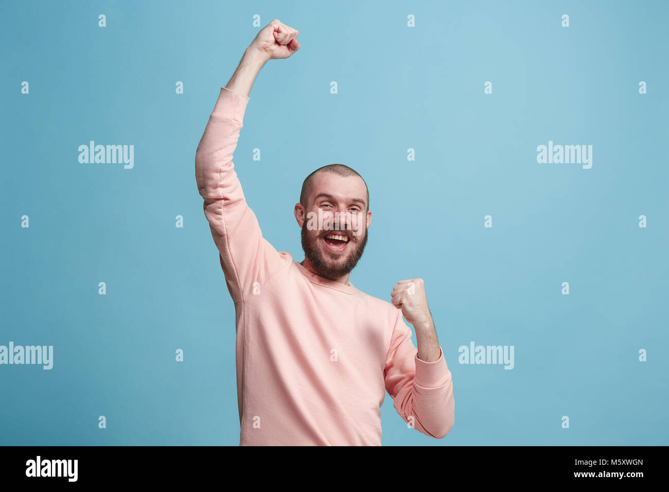 Winning success man happy ecstatic celebrating being a winner. Dynamic ...