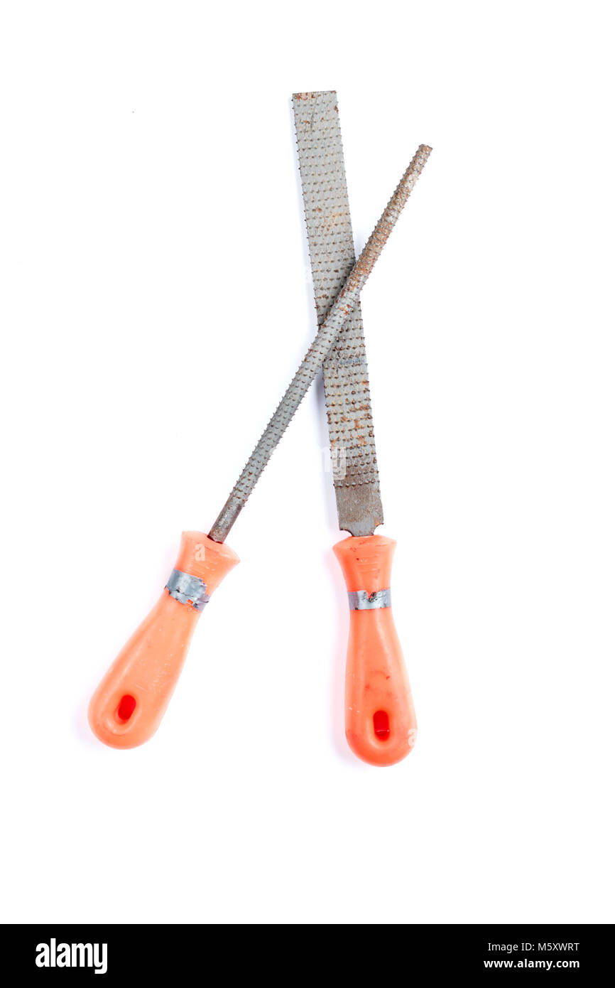 Set of Used metal file with orange handle isolated on a white ...