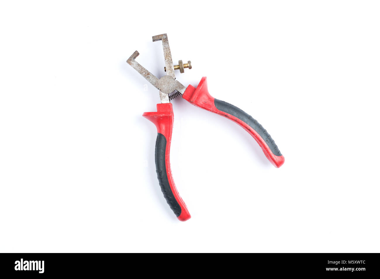 Pliers for removing isolation from electrical cables with red handles ...
