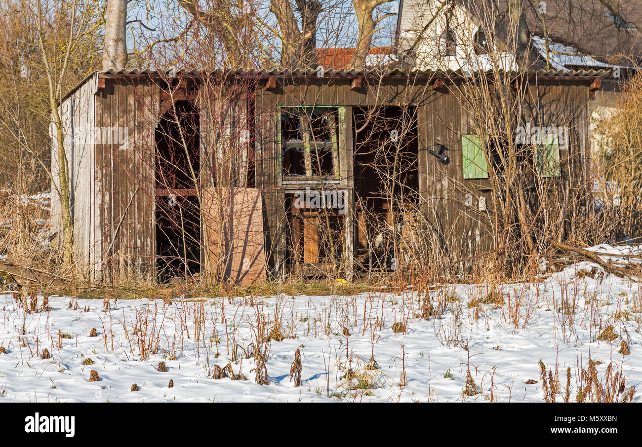 Old dilapidated hut in the snow Stock Photo - Alamy