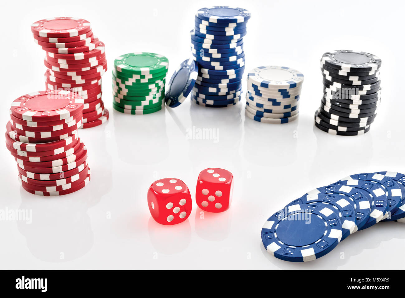 dice and gambling chips on white background 2 Stock Photo - Alamy