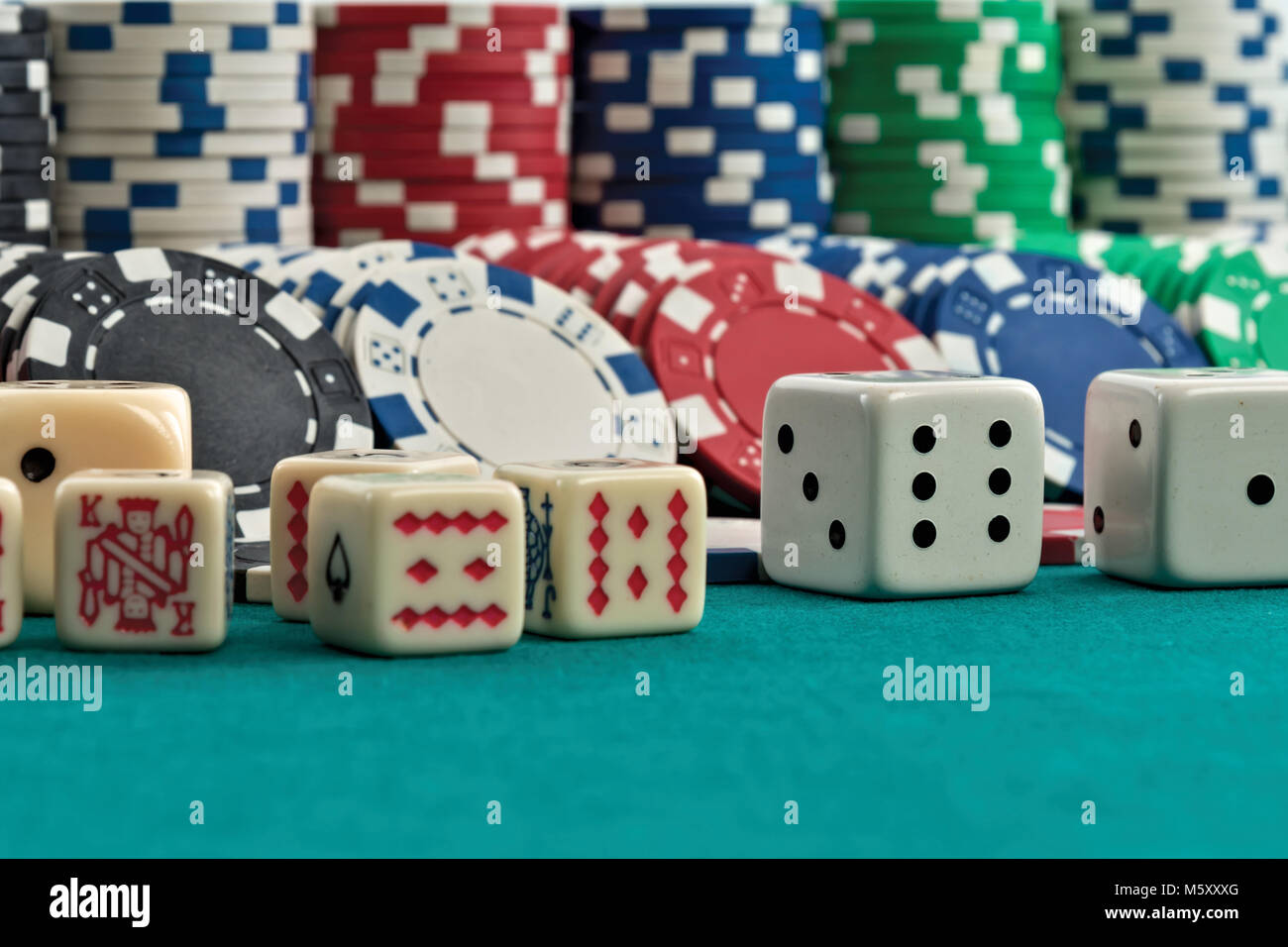 dice and tokens on green carpet 7 Stock Photo - Alamy