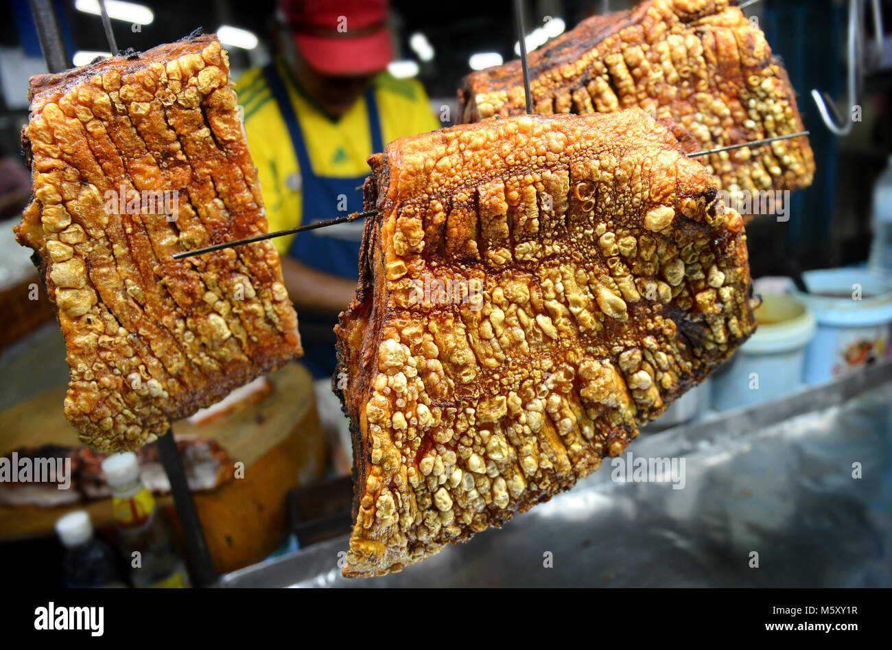 street delicious crispy pork in night market Stock Photo - Alamy