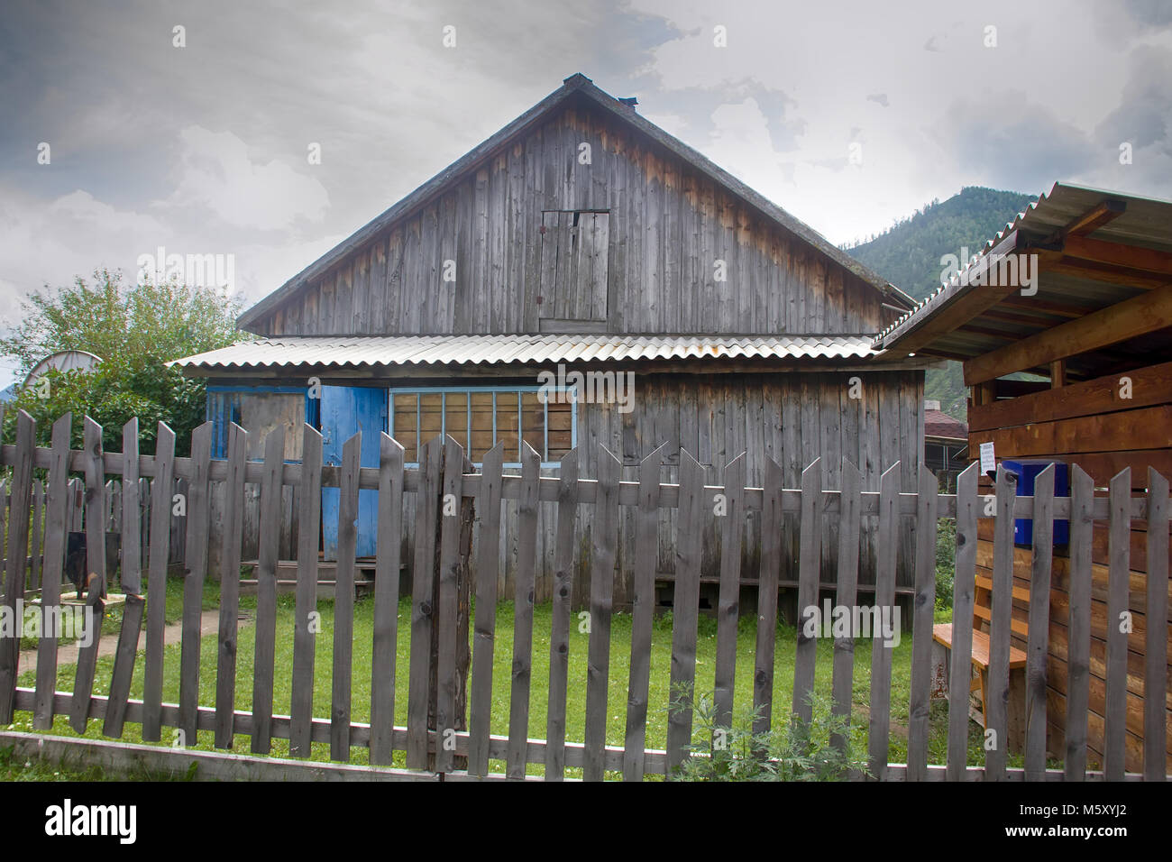 Old post office (rural house, wooden house) in Russian village. Altai ...
