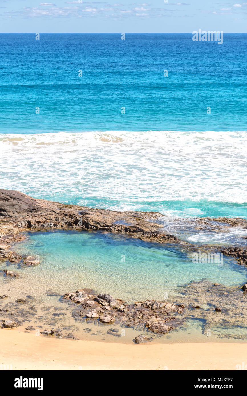in australia fraser island the beach near the rocks in the wave of ...