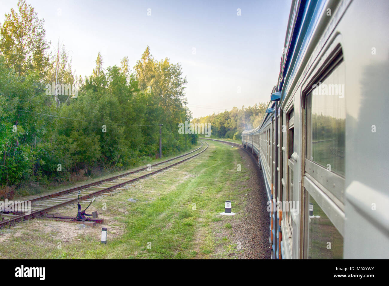 Usual mode of transport in Russia. Electric trains (commuter rail) with ...