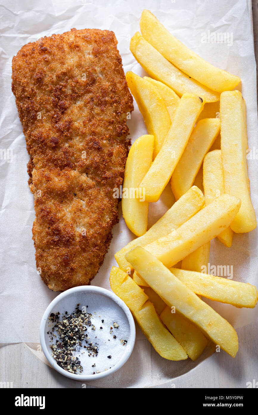 Breaded cod with chips. Fish and chips Stock Photo - Alamy