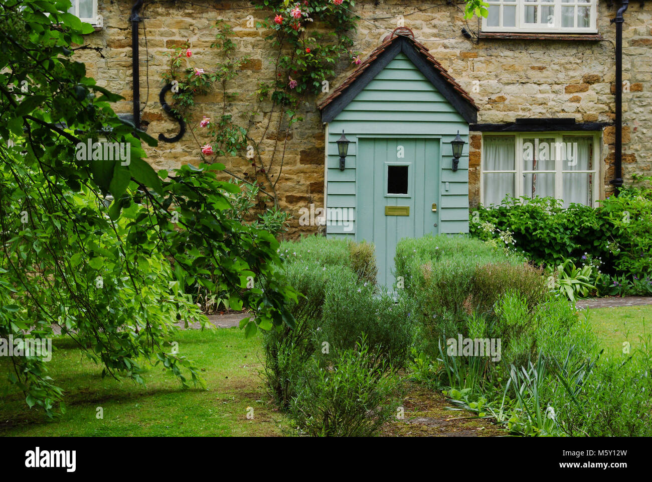 Frontage of a pretty country cottage in the village of Harrington; with ...