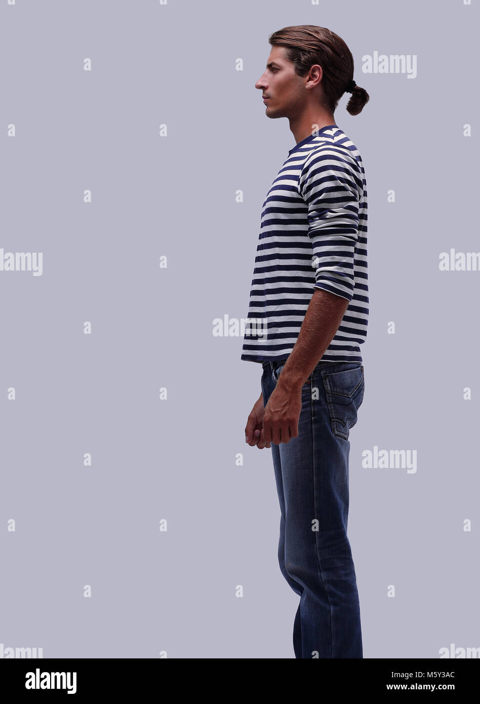 Side view. serious young man Stock Photo - Alamy