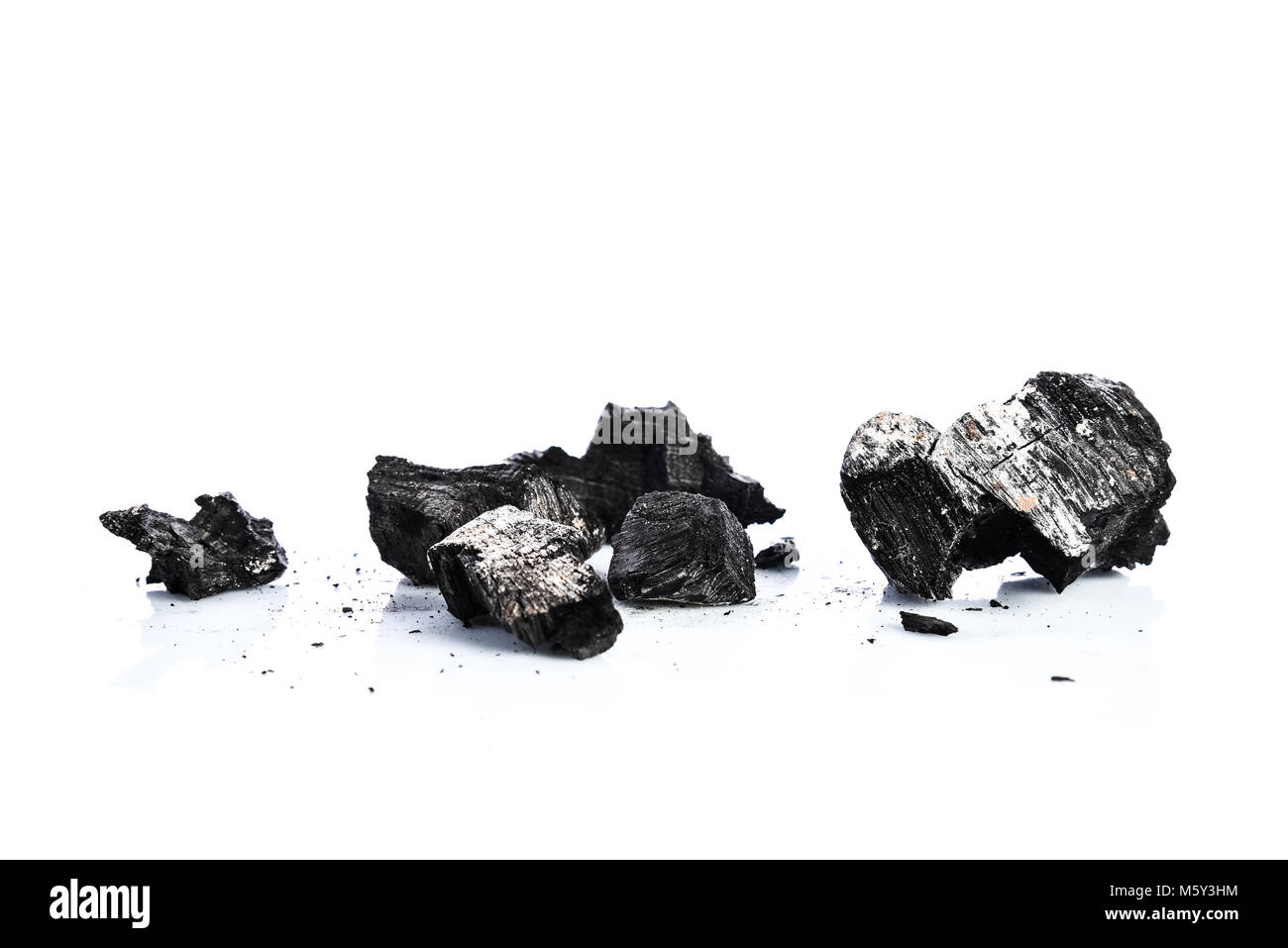 Ashes on white background, with shadows and reflections, copyspace ...