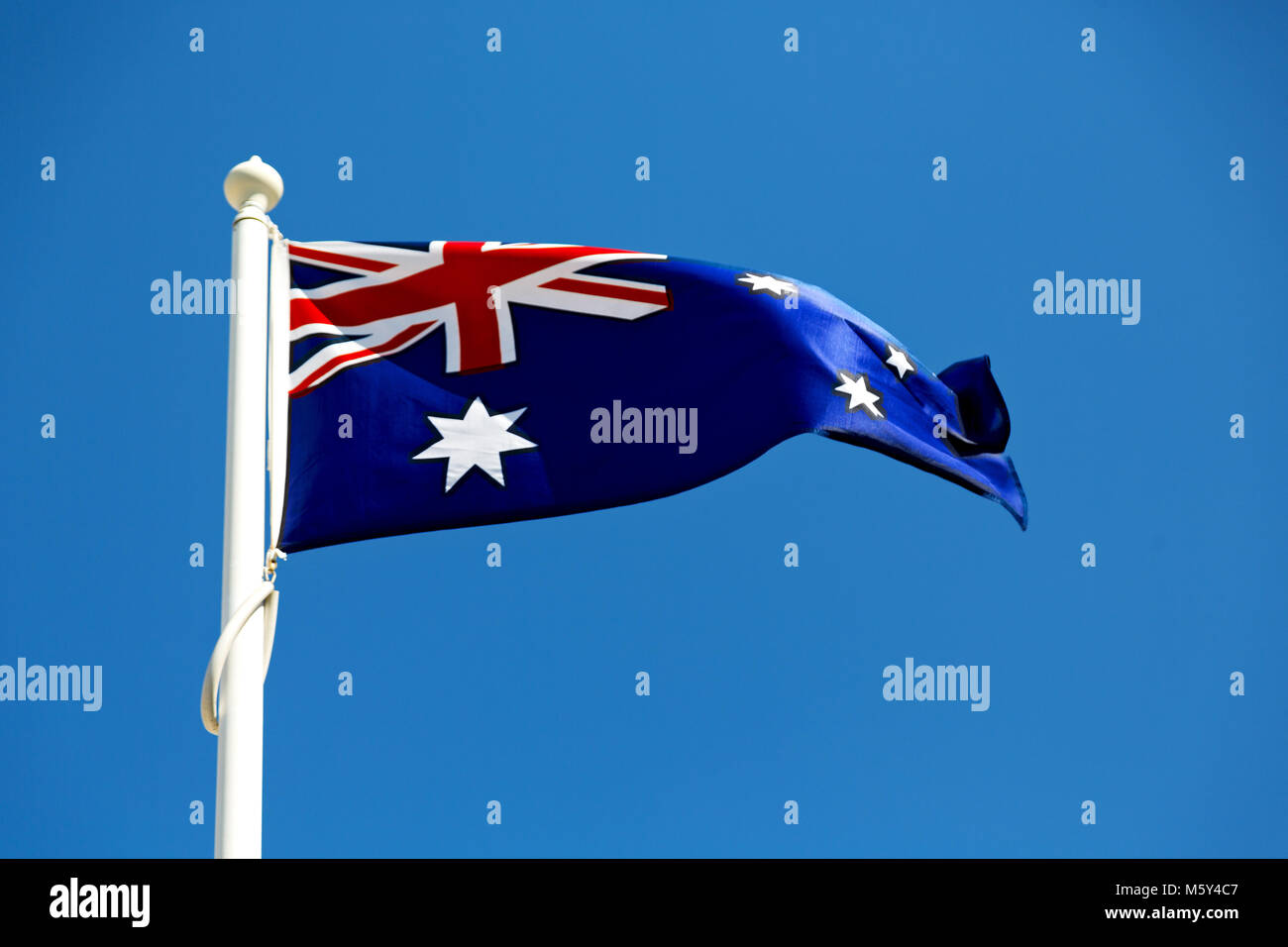australia in the clear sky the waving flag Stock Photo - Alamy