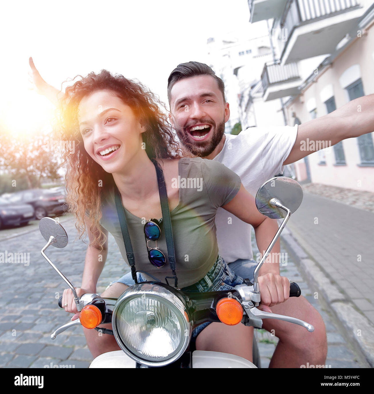 Couple and scooter hi-res stock photography and images - Alamy