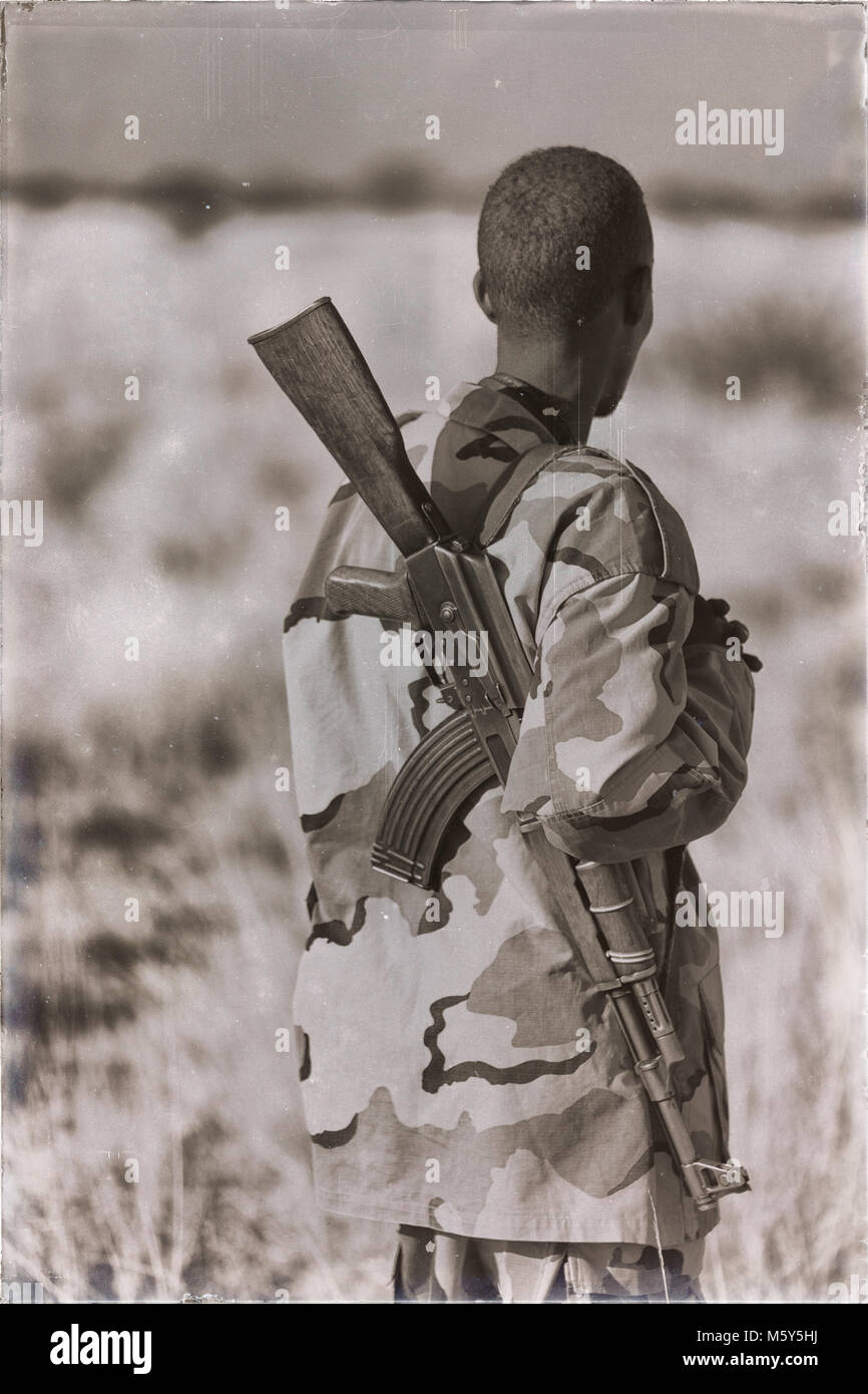 africa in the land of ethiopia a black soldier and his gun looking the ...