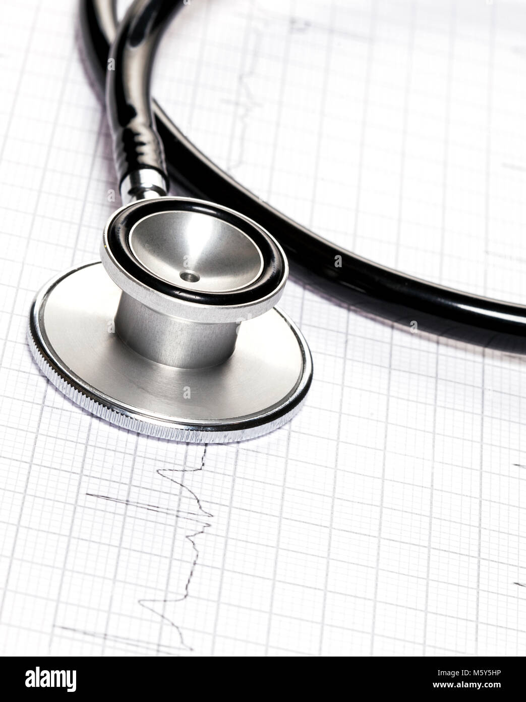 Stethoscope in the shape of heart beat on electrocardiogram Stock Photo ...