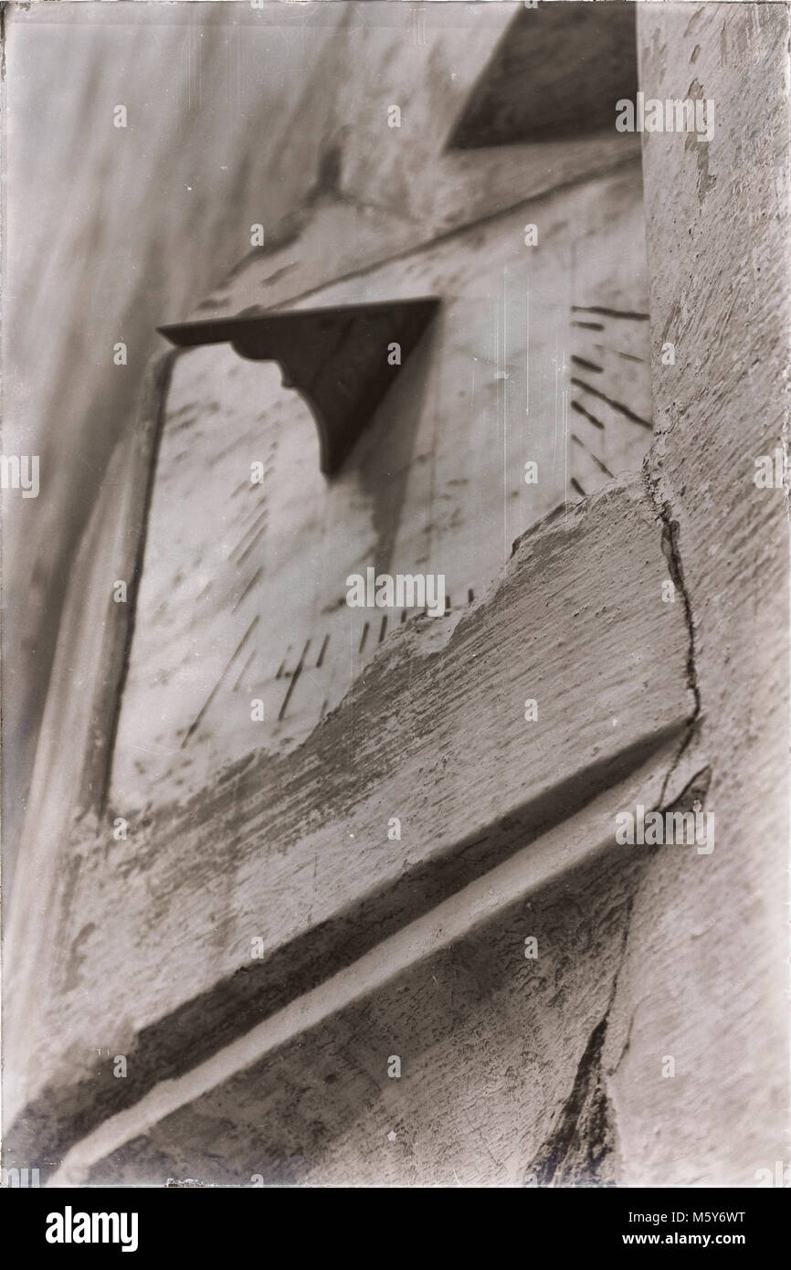 and the gnomon in the antique broken wall Stock Photo - Alamy