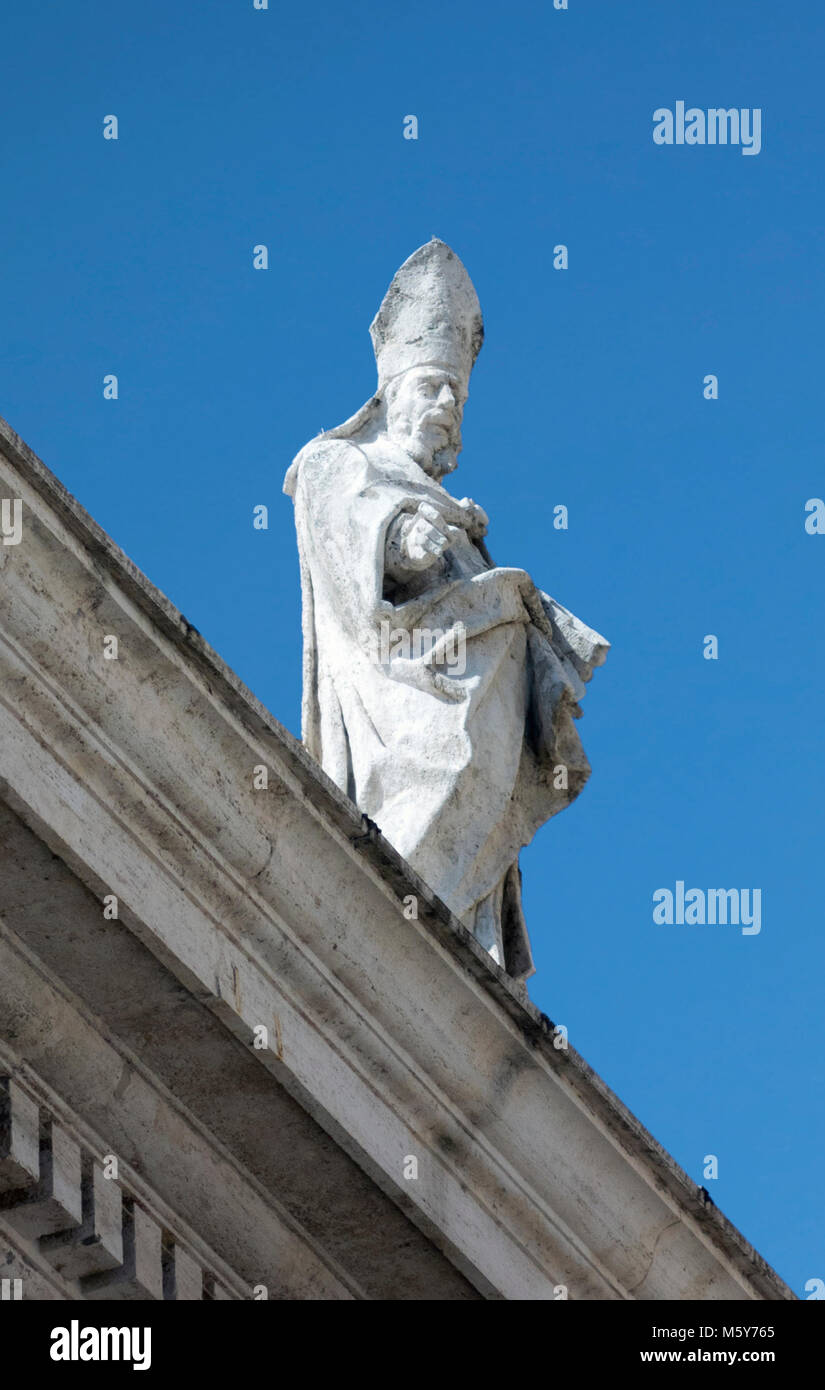 Statue of a pope over the piazza of St. Peter's Basilica in Rome, 2017 ...