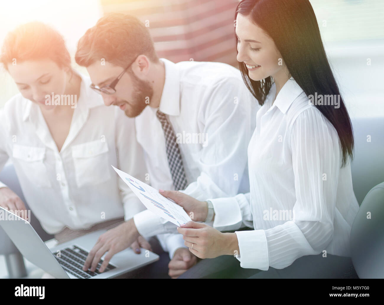 business team working with financial charts in the office Stock Photo ...
