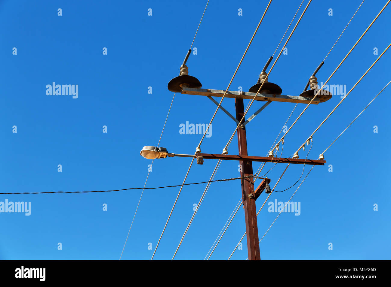 in australia the concept of power line with electrical pole in the ...