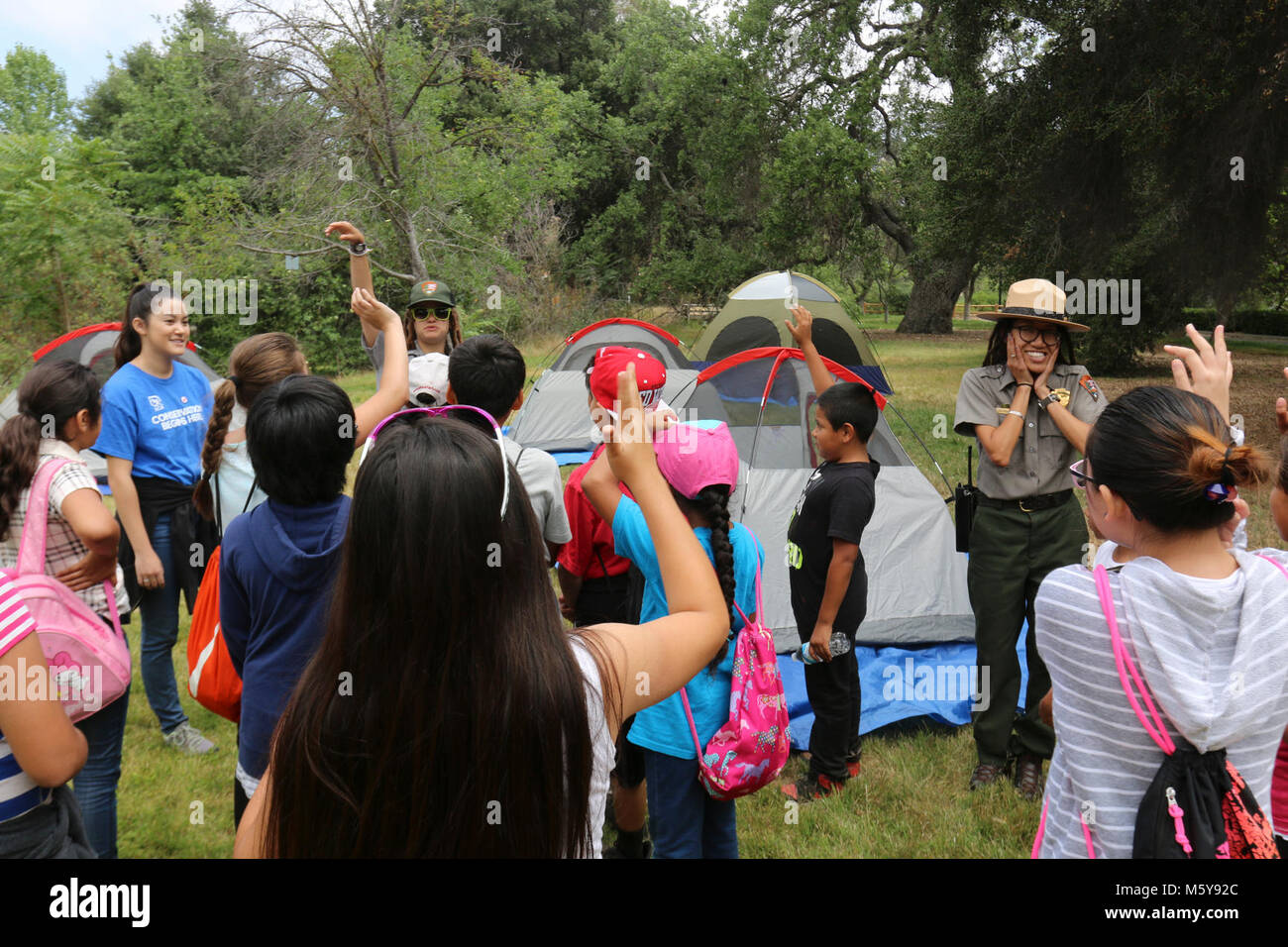 Camping Activity. Students split into groups to join a ranger and learn ...