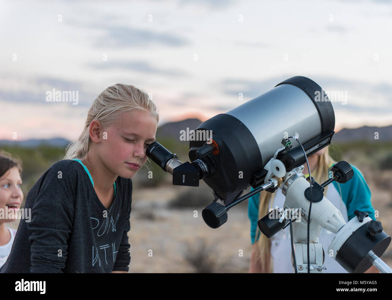 Observing the moon through a telescope; 205 Night Sky Festival Stock ...