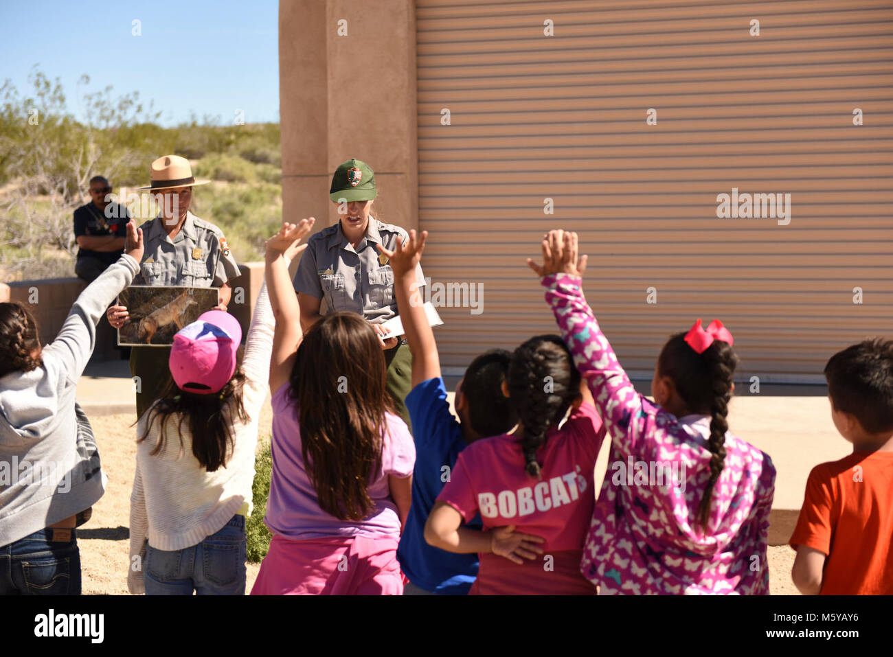 Ranger talking to students Stock Photo - Alamy