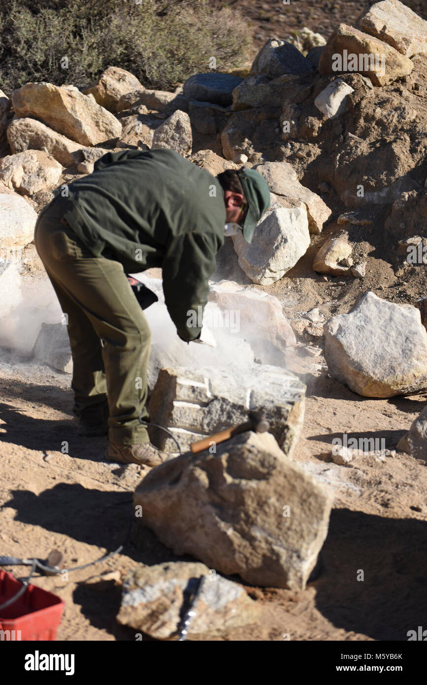 Rock Work. Trail crew works on rocks that will be used on trail ...