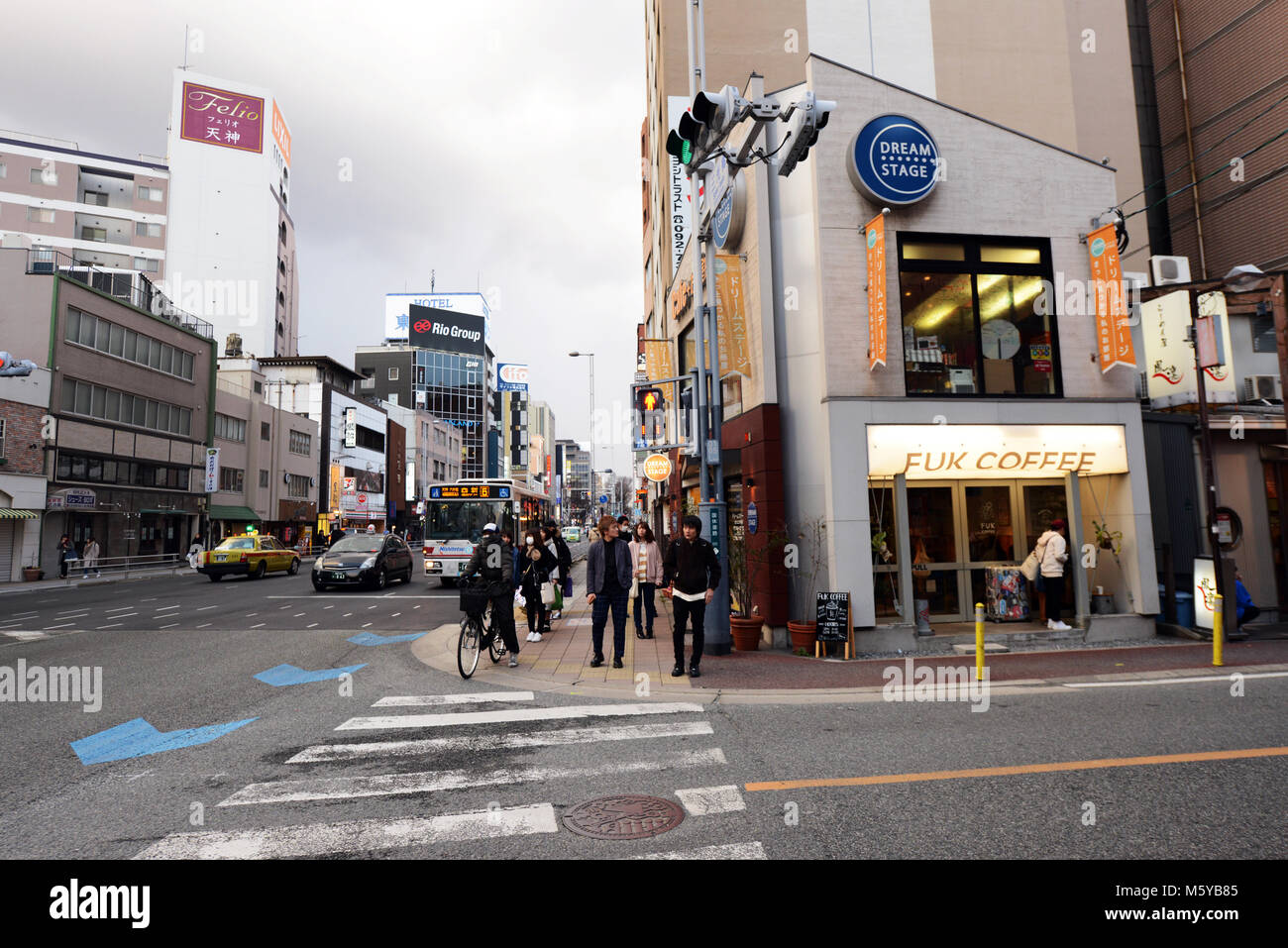 Pedestrians waiting for green light Stock Photo - Alamy