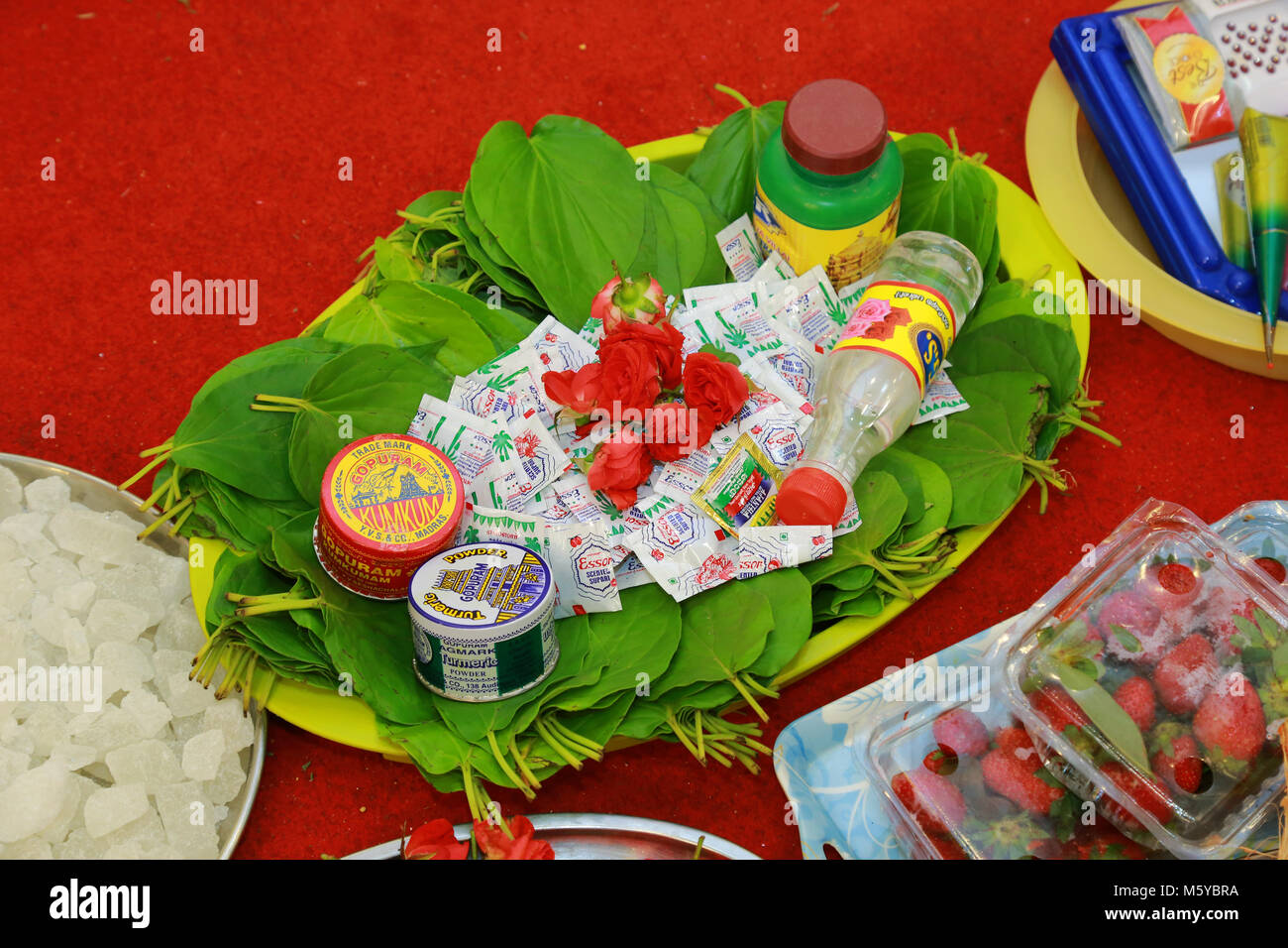 Stack of betel leaf with fruits and flowers Stock Photo - Alamy