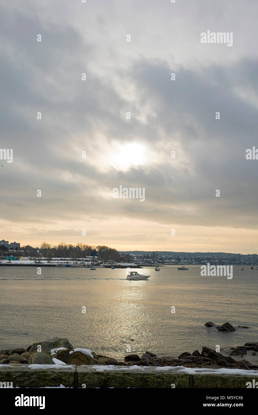 Sun setting on boat Stock Photo - Alamy
