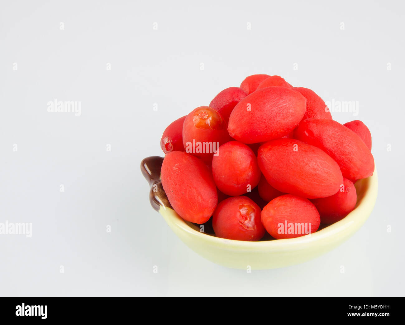 Dried olive. chinese preserved olive on the background Stock Photo - Alamy