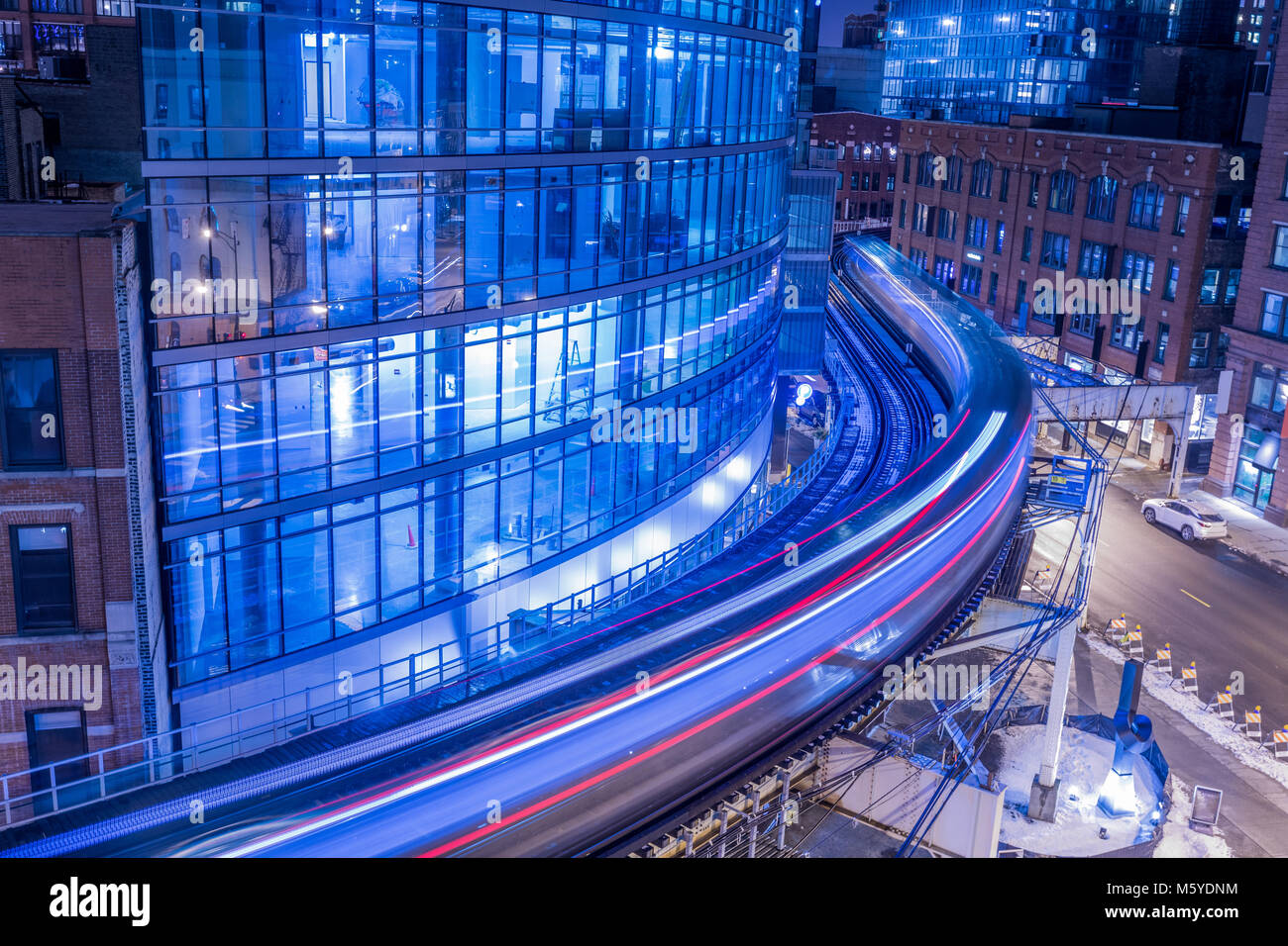 Chicago downtown train light trails in the city at night Stock Photo ...
