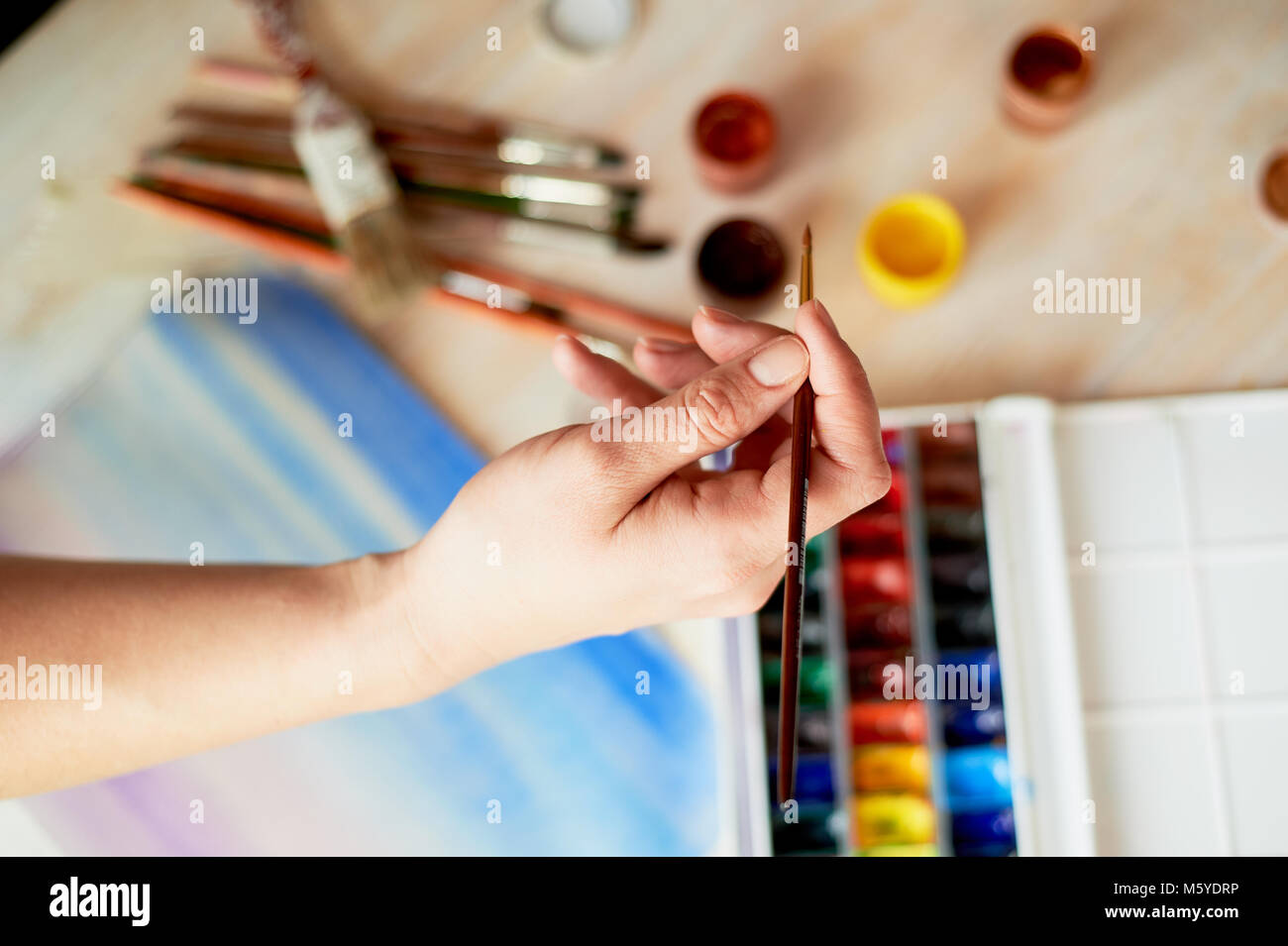 The process of creating an illustration by the artist. Watercolor paint ...