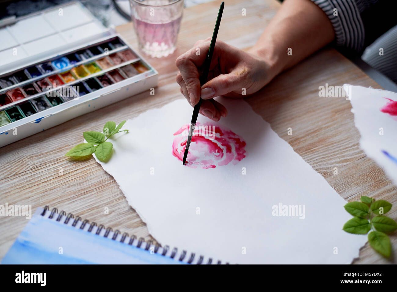 The process of creating an illustration by the artist. Watercolor paint ...