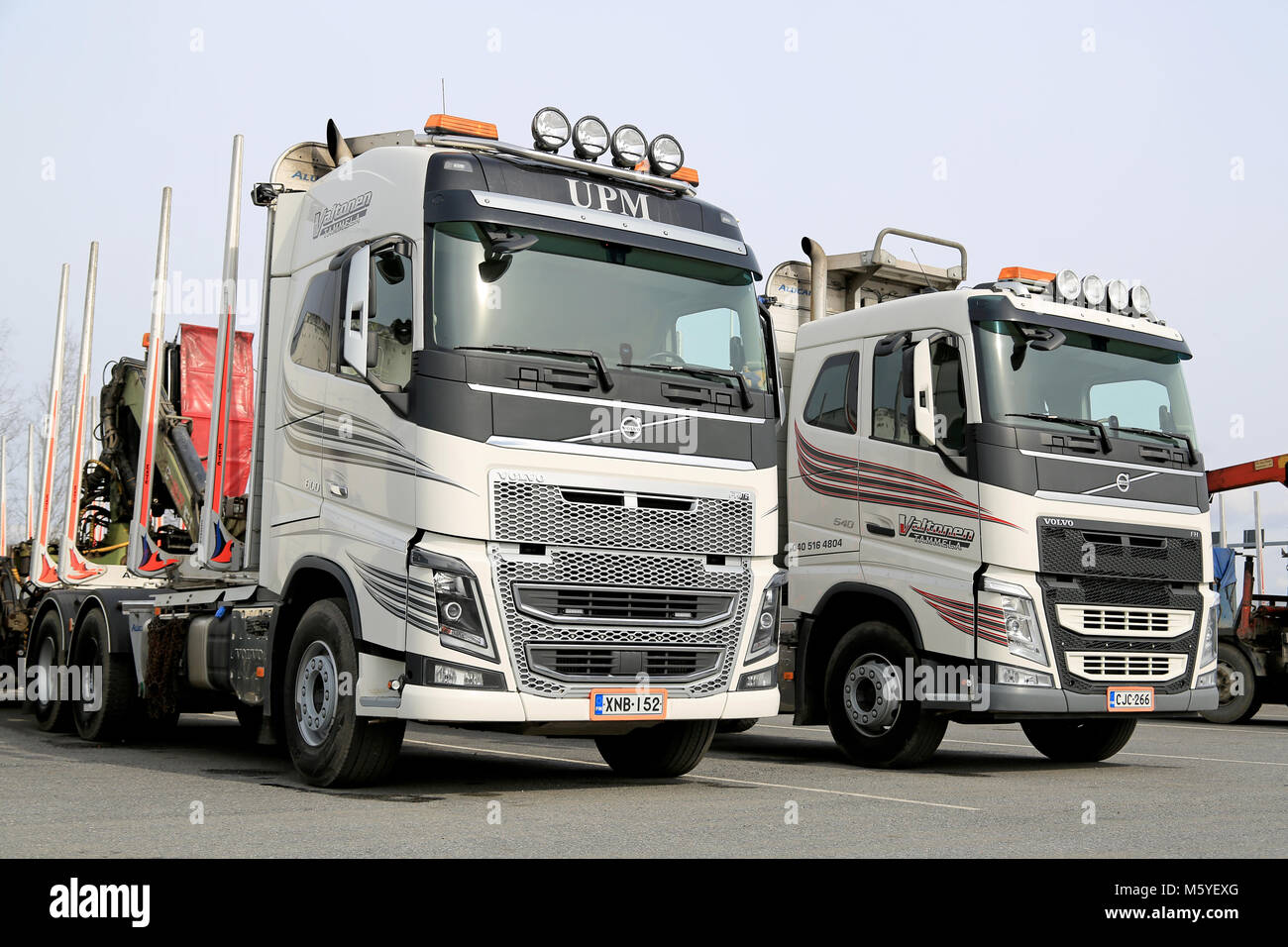 Two logging trucks hi-res stock photography and images - Alamy